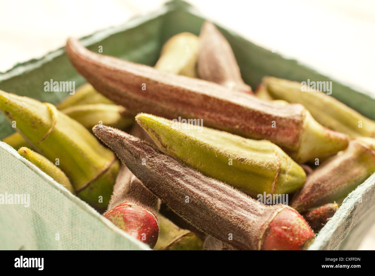 punnet or basket of fresh okra Stock Photo - Alamy