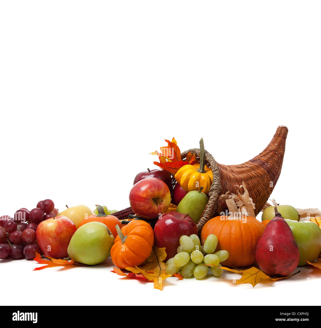 An overflowing cornucopia on a white background Stock Photo - Alamy