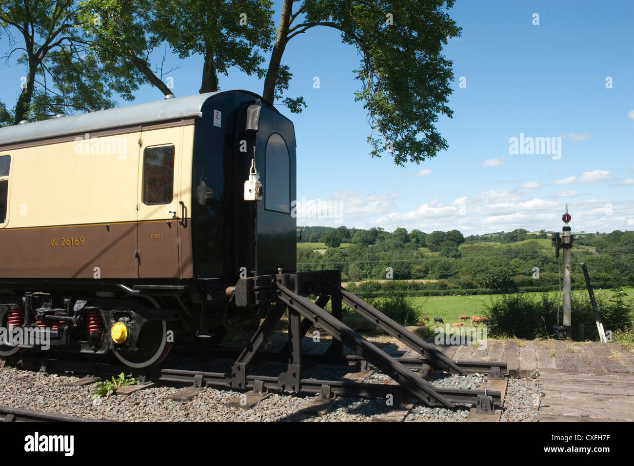 Railway carriage and semaphore signal at Titley Junction Stock Photo ...