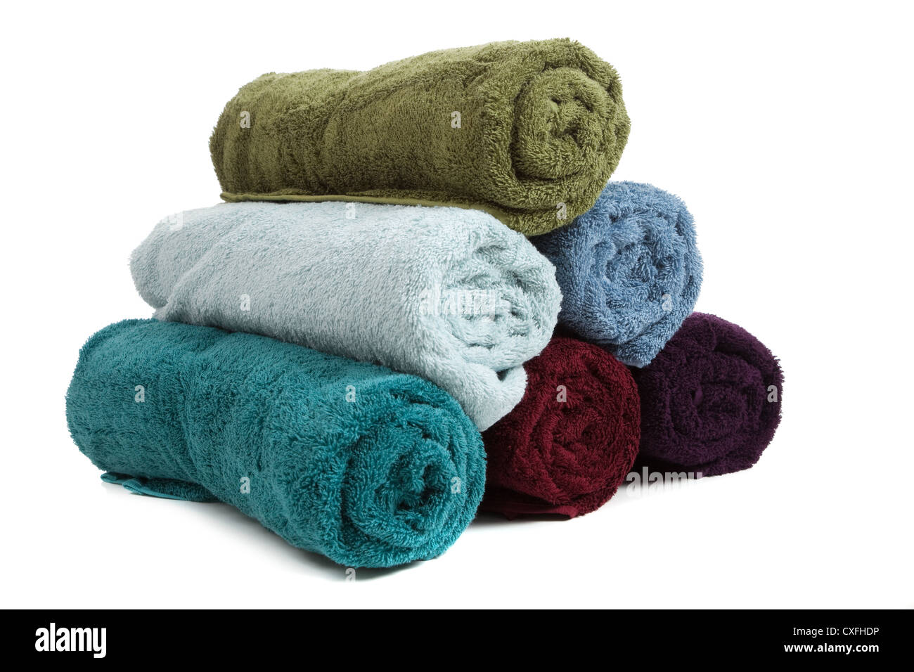 A set of multi-colored terry cloth towels on a white background Stock ...