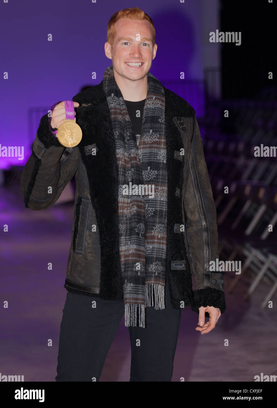 greg rutherford displays his gold medal at the Style Birmingham 2012 ...