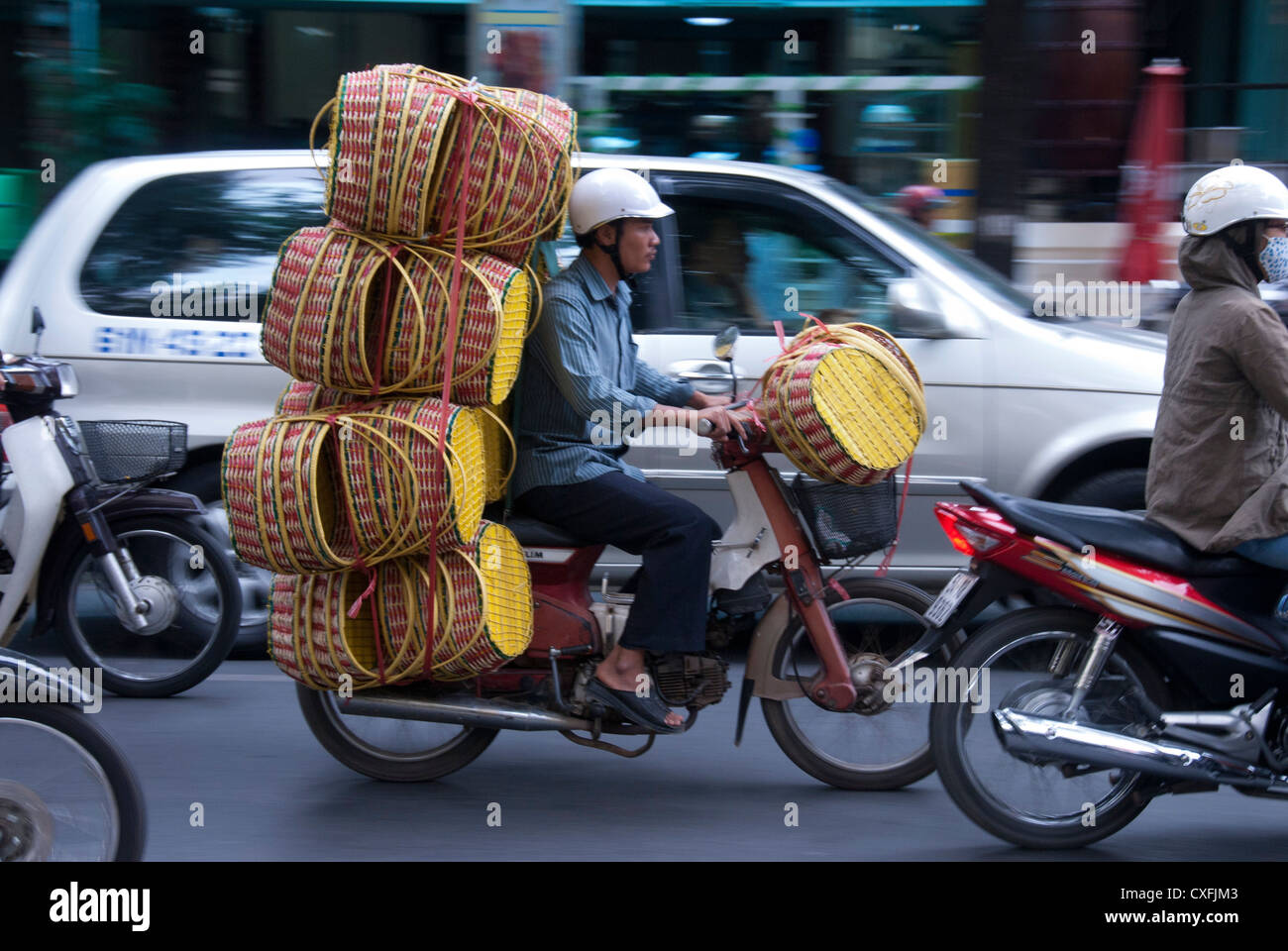 Motorcycle with large load of baskets hi-res stock photography and ...