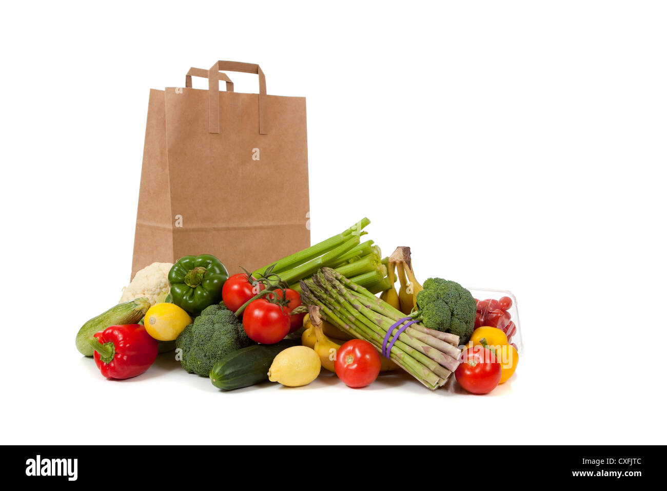 Brown grocery sack with fresh vegetables on a white background with ...