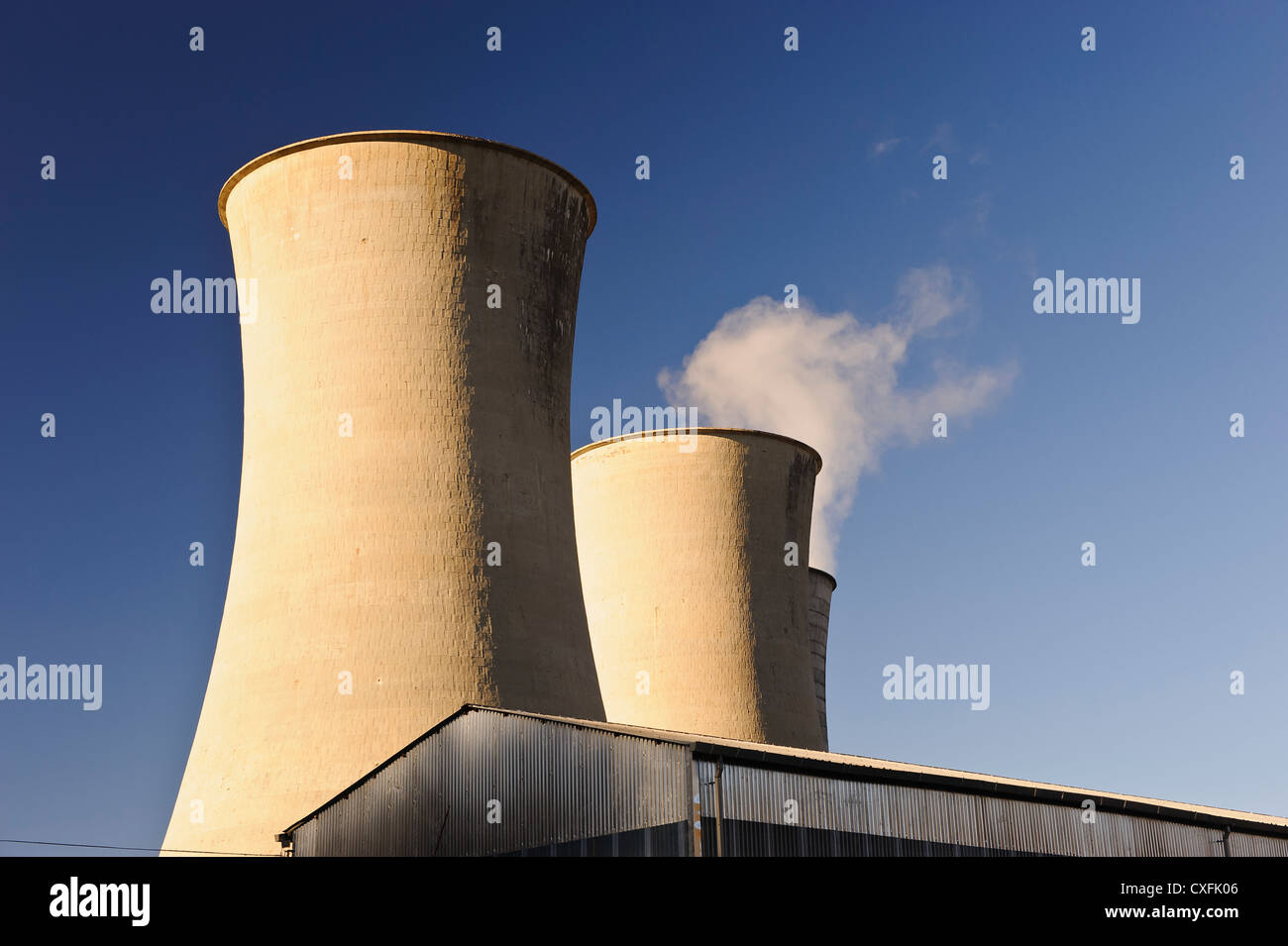 electric power plant chimneys with sky blu' Stock Photo - Alamy