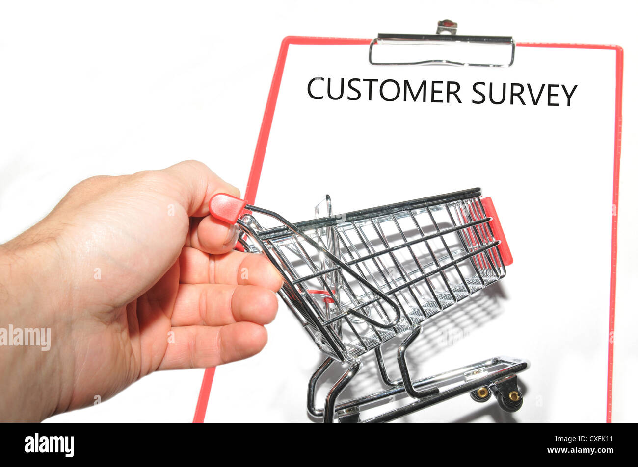 Customer service survey concept with clipboard and hand holding ...