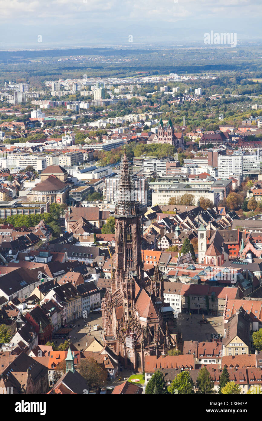Old houses and minster with high tower of gothic town, Freiburg im ...