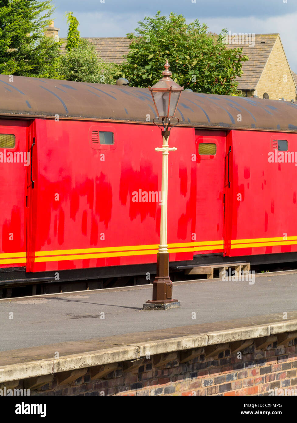 A station on a railway line in the countryside Stock Photo - Alamy
