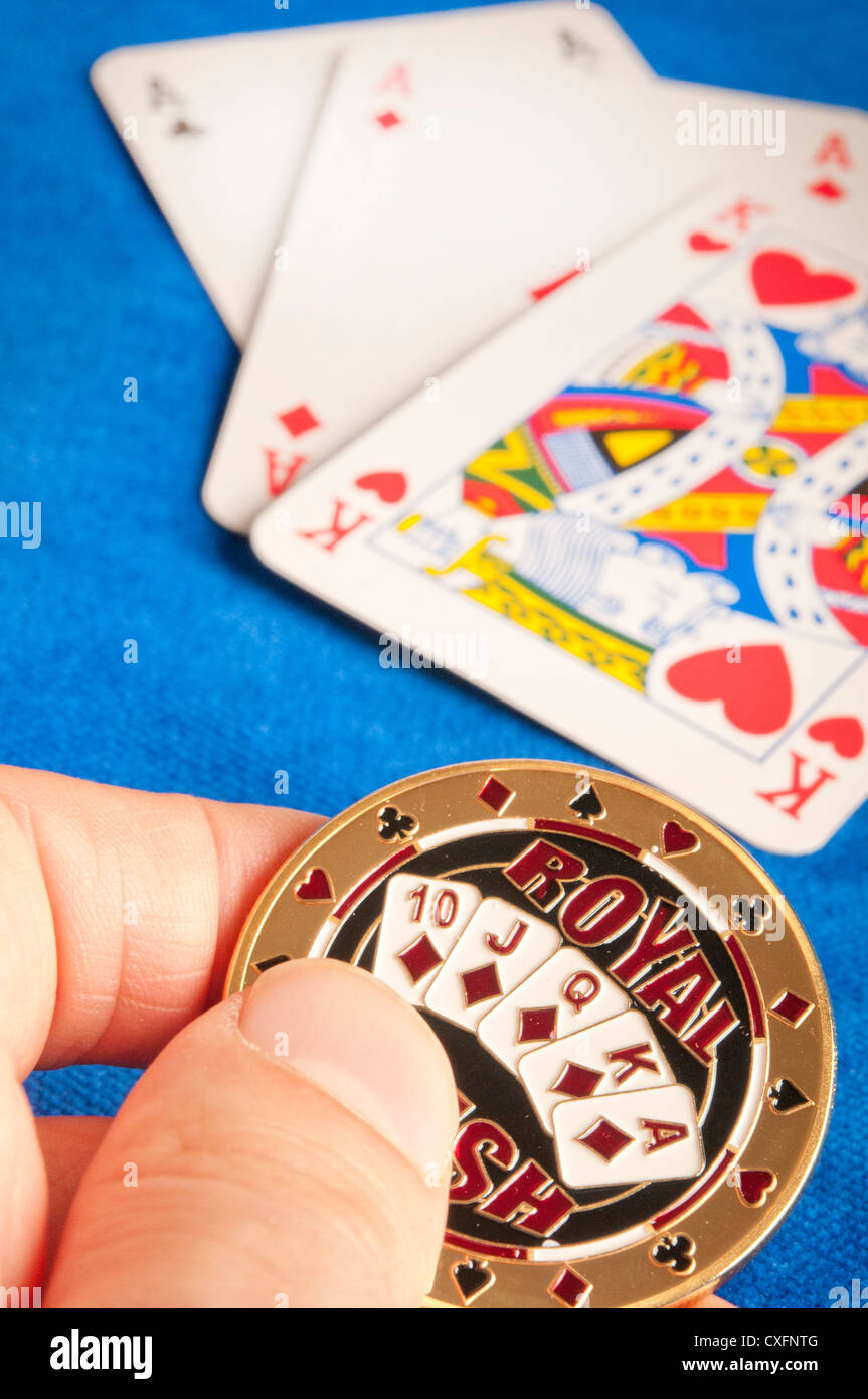 hand holding a lucky coin Stock Photo - Alamy