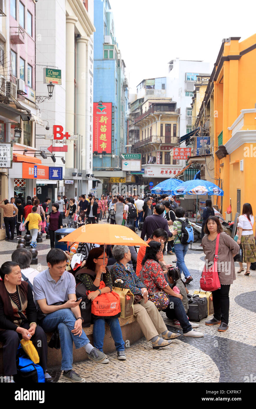 People resting in Macau Stock Photo - Alamy