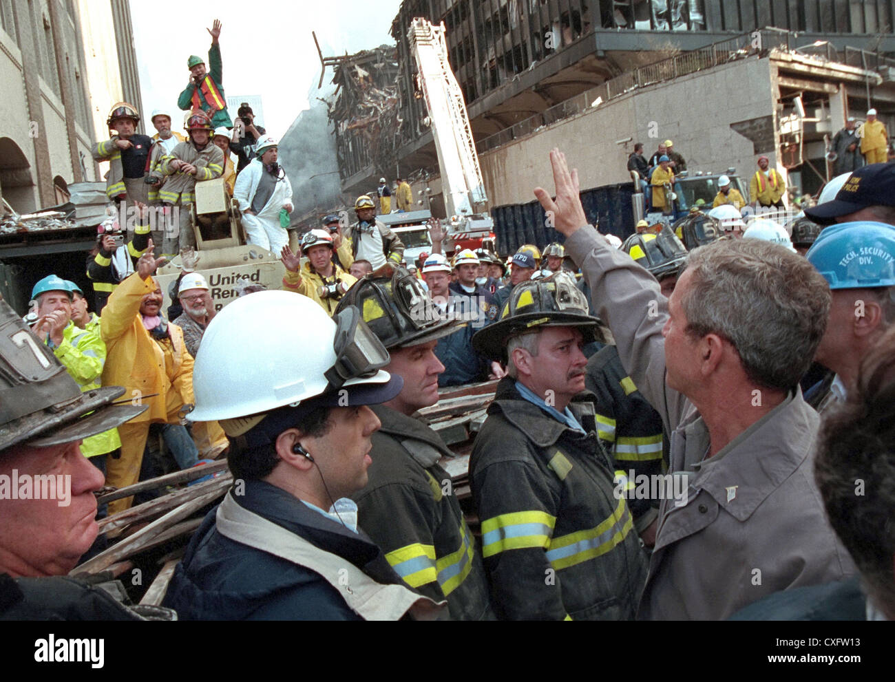 US President George W. Bush greets rescue workers and firefighters at ...