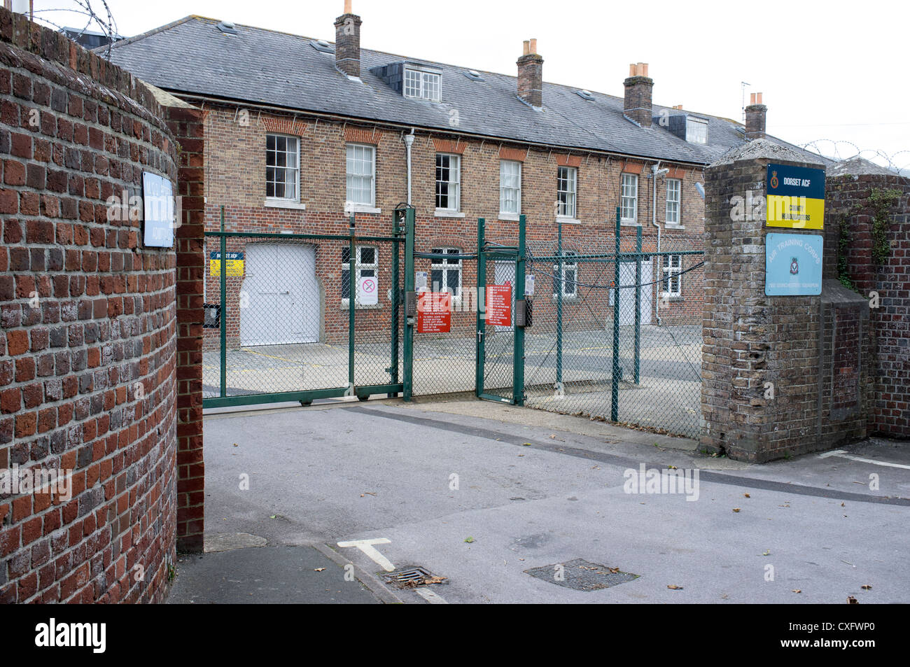 High security gates and fence at the entrance to Government Ministry of ...
