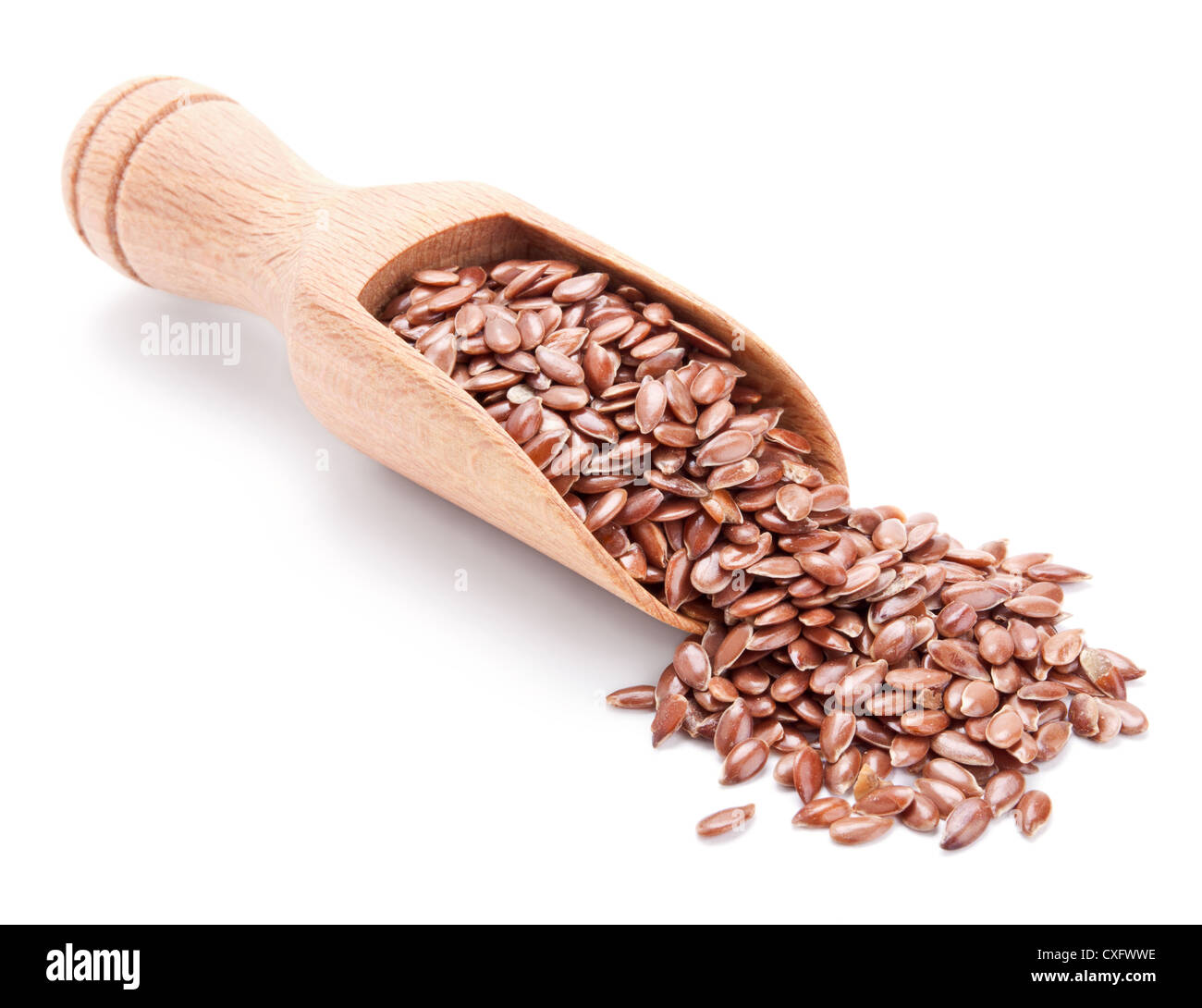 wooden scoop with flax seeds isolated on white background Stock Photo - Alamy