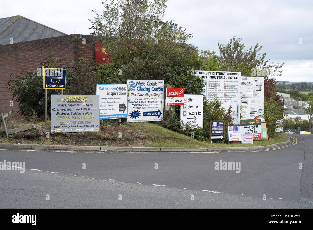 Advertising signs at the entrance to an industrial estate Stock Photo ...