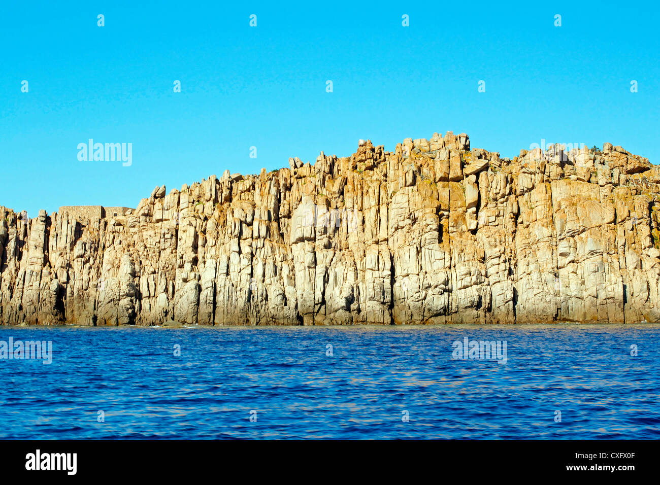 Rock of granite in the sea Stock Photo - Alamy