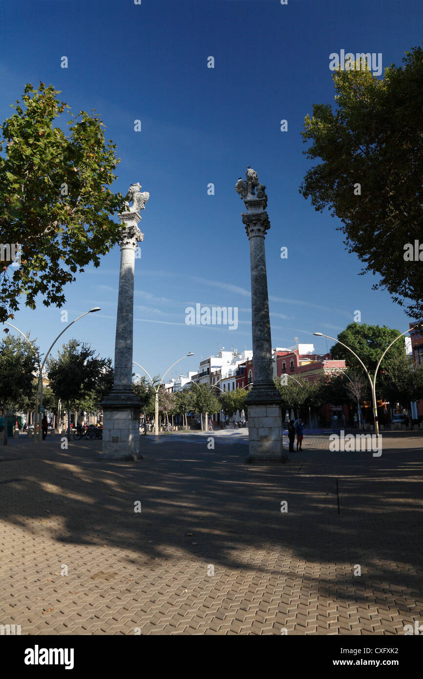 Roman columns topped with statues of Hercules and Julius Caesar at the ...