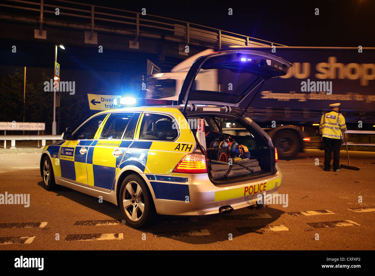 Metropolitan Police Traffic Car at the scene of a late night collision ...