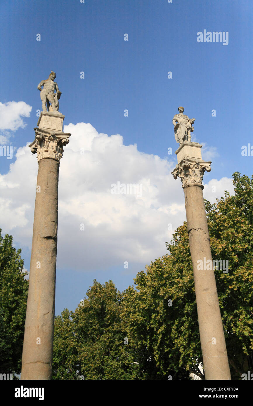 Roman columns topped with statues of Hercules and Julius Caesar at the ...