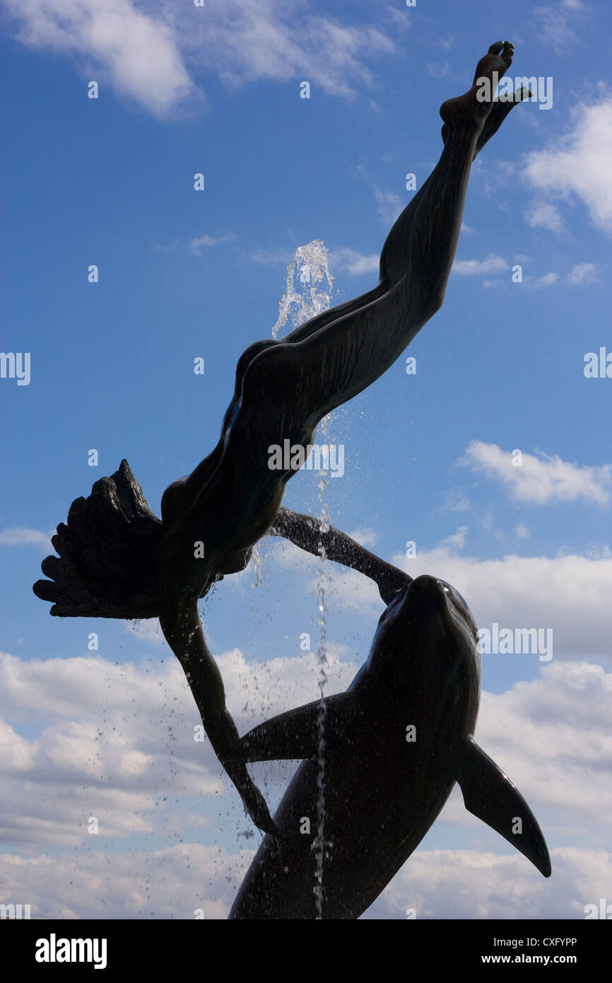 Dolphin statue by tower bridge, london Stock Photo - Alamy