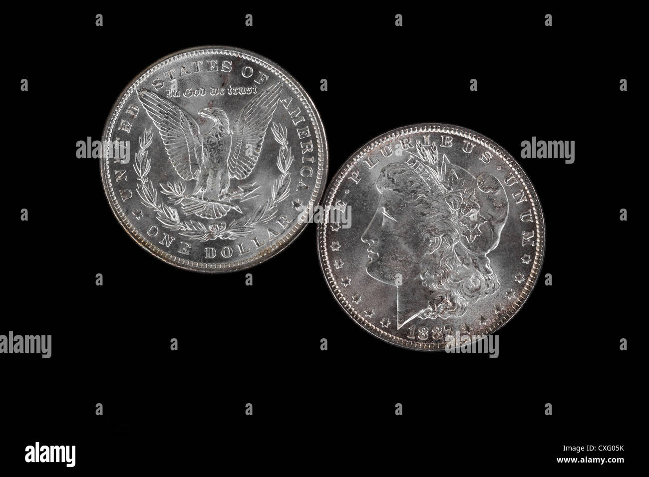 Obverse and Reverse of American Silver Dollar isolated on Black ...