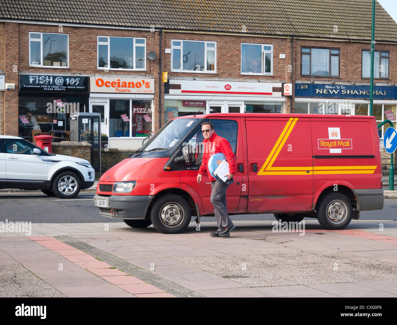 Postman delivering letter hi-res stock photography and images - Alamy