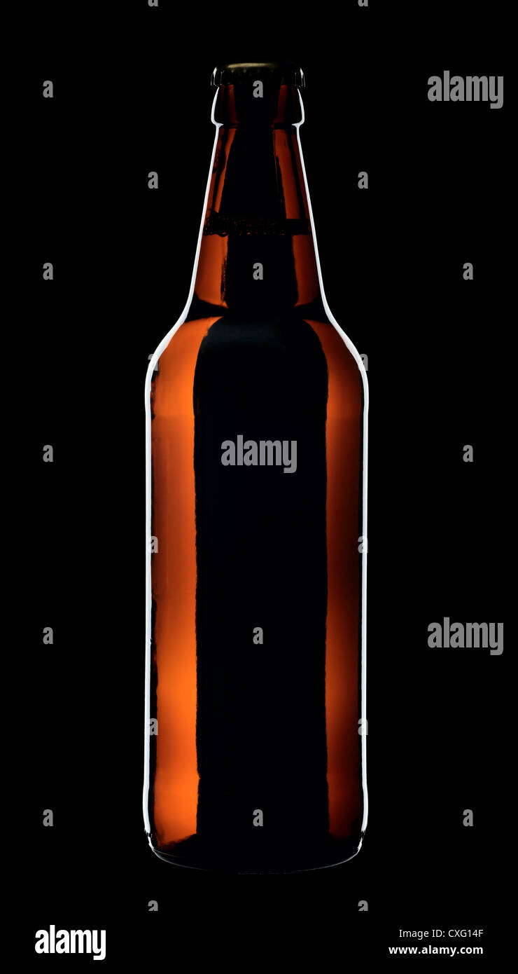 Bottle of lager beer from brown glass, isolated on a black background ...