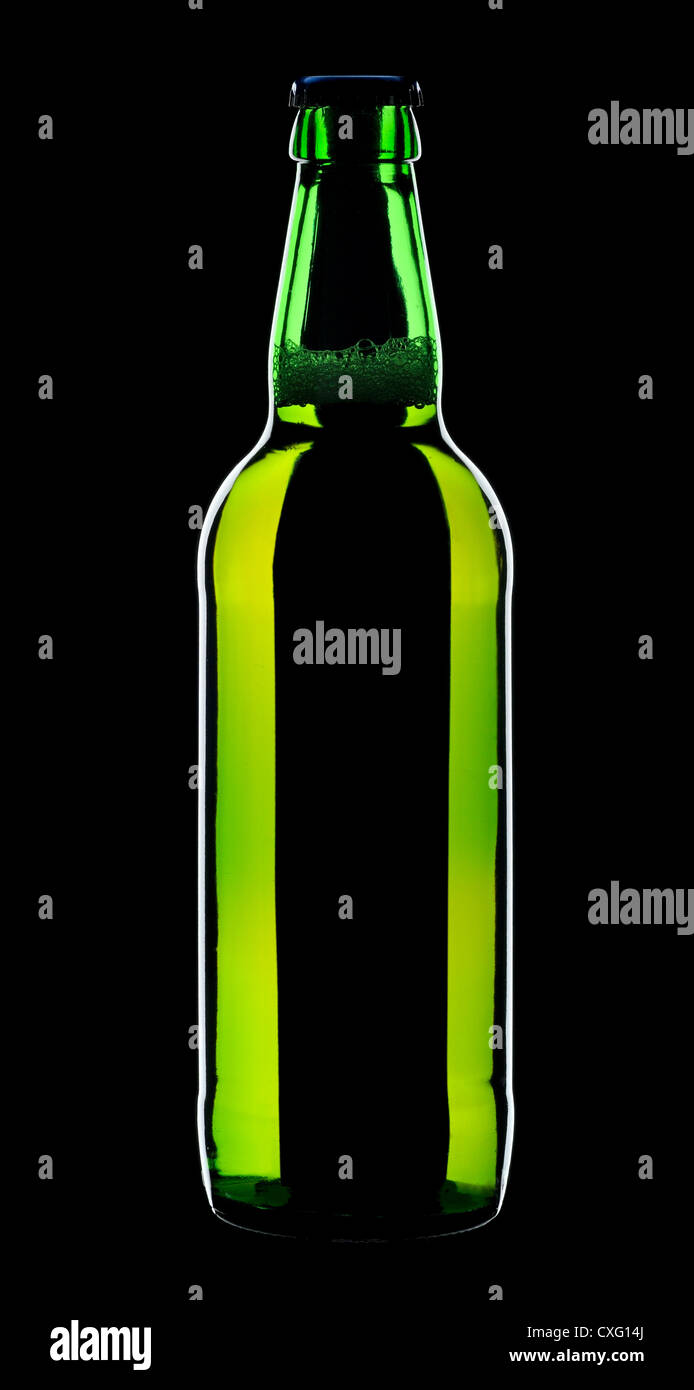 Bottle of lager beer from green glass, isolated on a black background ...