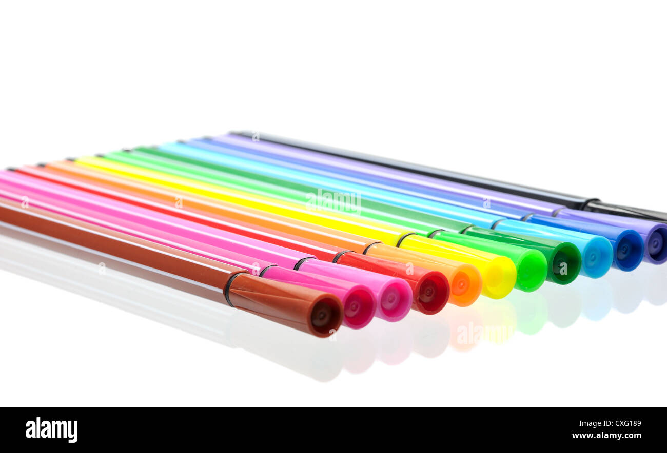 Multi-colored felt pen and their reflection in the glass surface ...