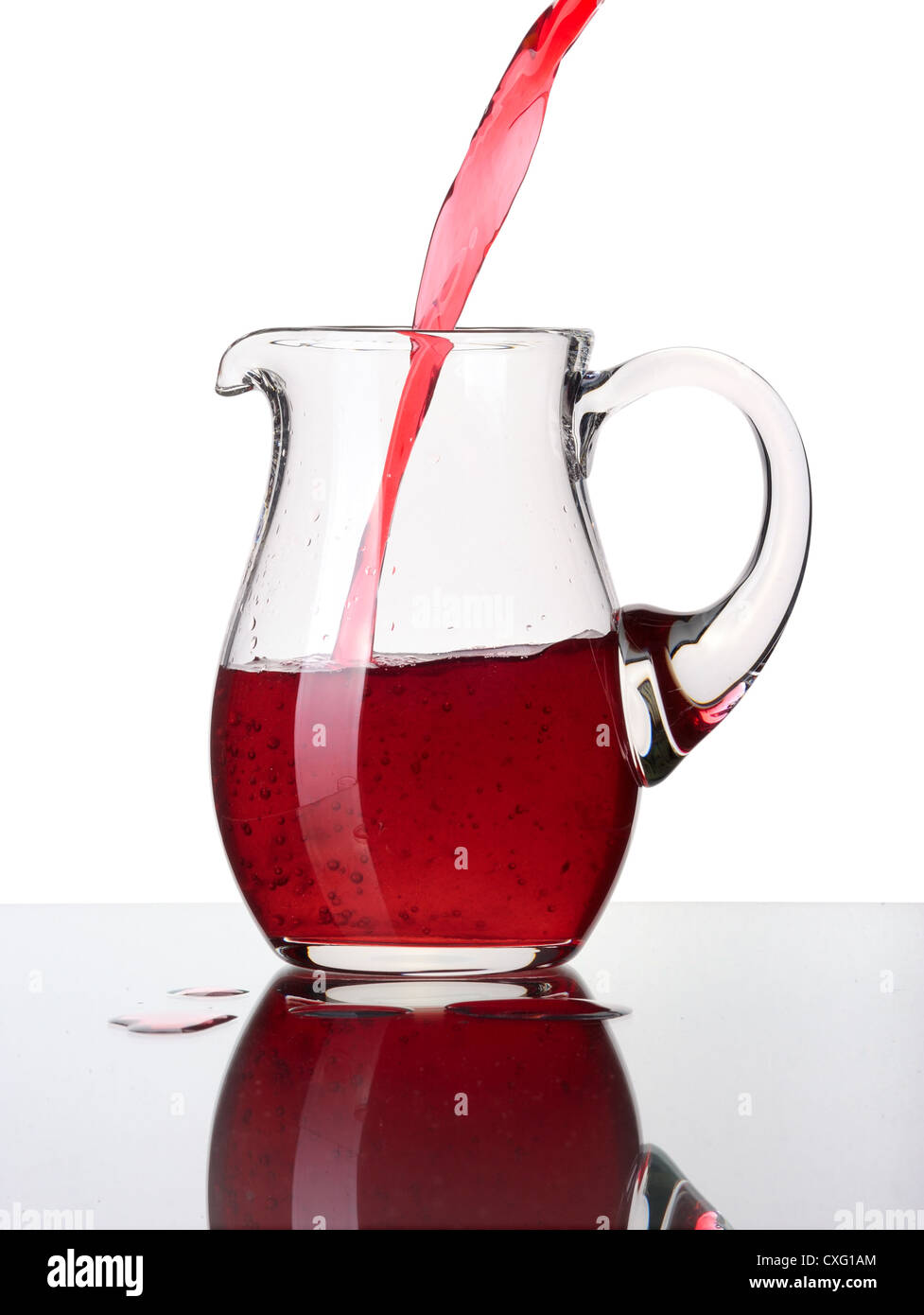 Glass pitcher, isolated on a white background Stock Photo - Alamy