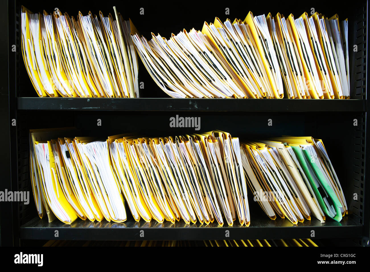 confidential medical and business files sitting on office shelves Stock ...