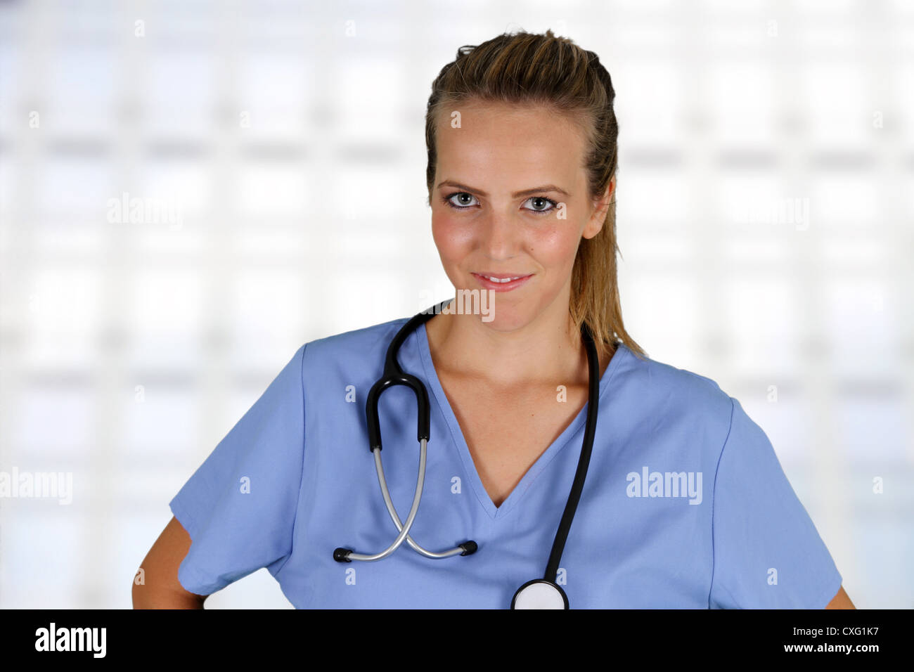 Young female nurse working in a hospital Stock Photo - Alamy