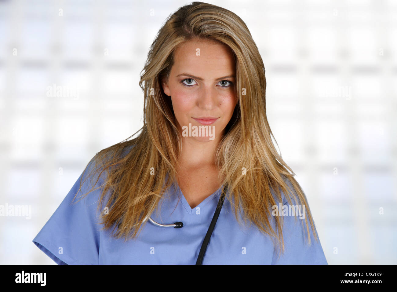 Young female nurse working in a hospital Stock Photo - Alamy