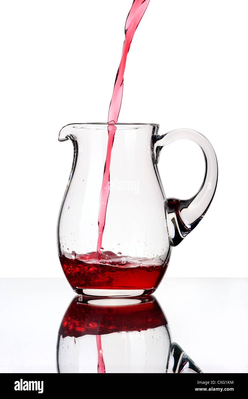 Glass pitcher, isolated on a white background Stock Photo - Alamy