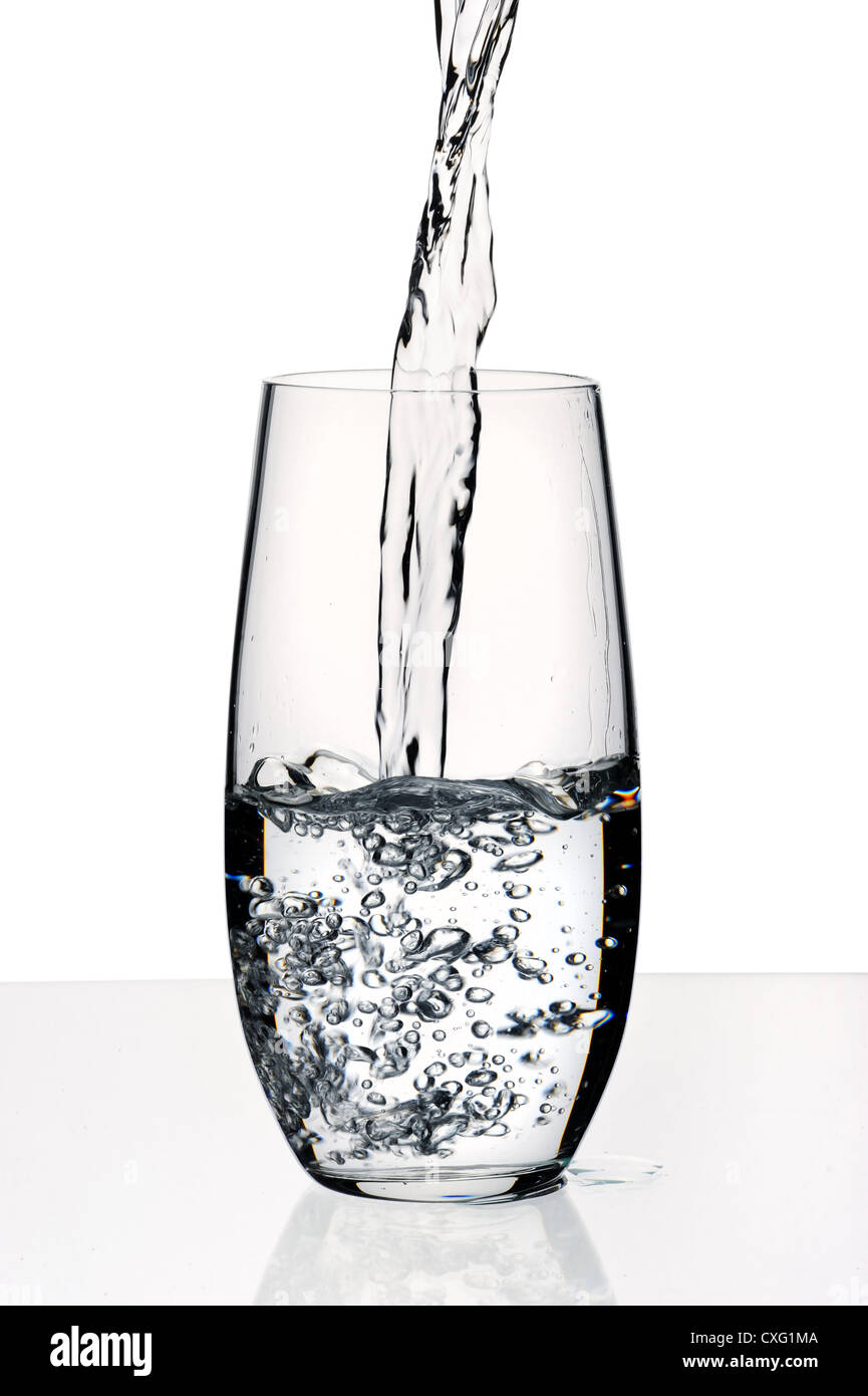 Glass with a water, isolated on a white background Stock Photo - Alamy