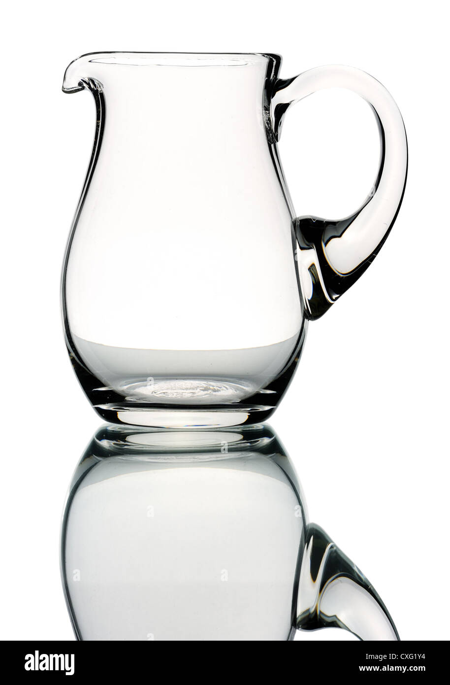Glass pitcher on a white background, isolated Stock Photo - Alamy