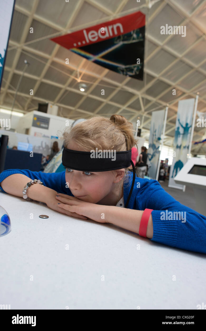 Intech Science Centre child wearing headband to detect Alpha brainwaves ...