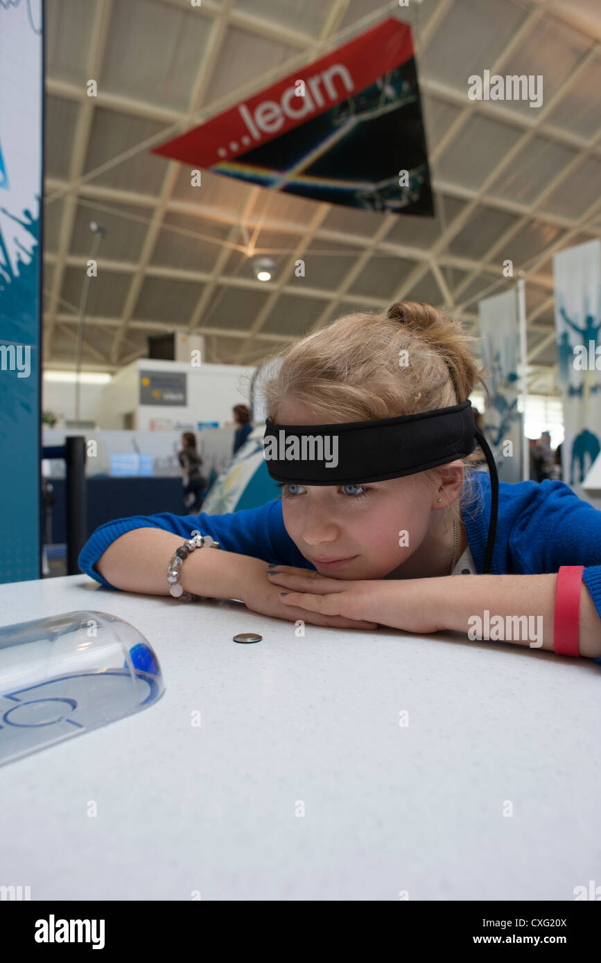 Intech Science Centre child wearing headband to detect Alpha brainwaves ...