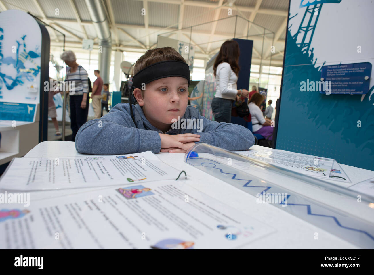 Intech Science Centre child wearing headband to detect Alpha brainwaves ...