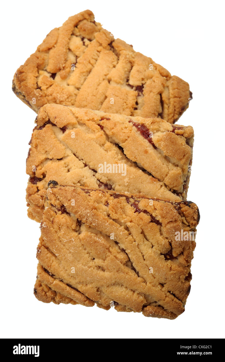 Several pieces of brown sweet cookies, isolated Stock Photo - Alamy