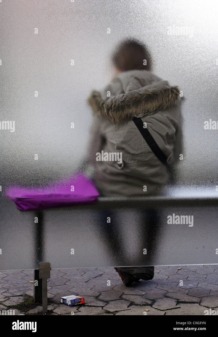 Sitting bus stop sad hi-res stock photography and images - Alamy