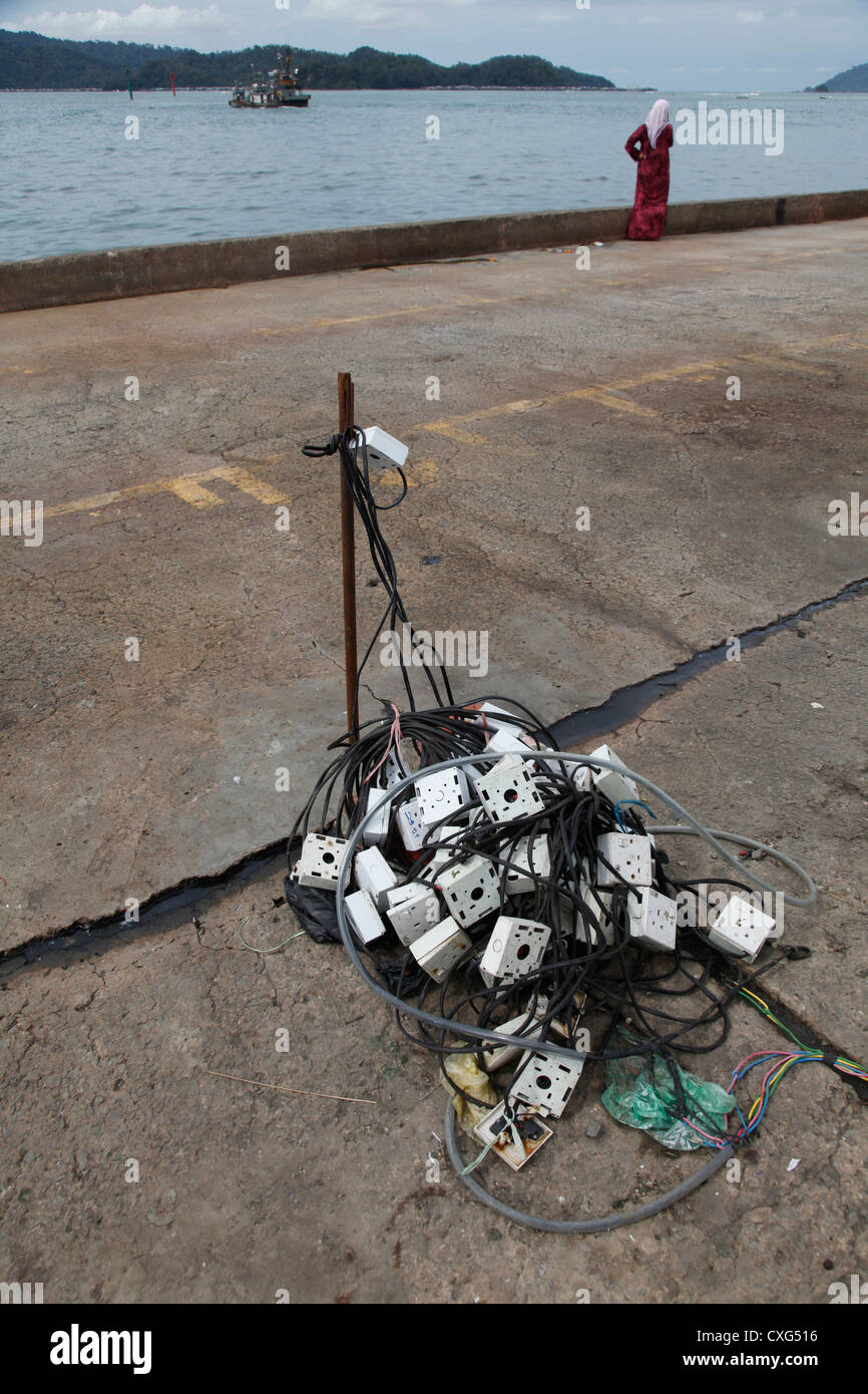 Electrical plugs at the harbour of Kota Kinabalu in Borneo, Malaysia ...