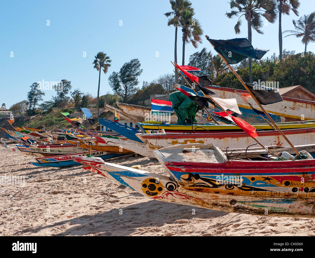 Rowing and fishing boats on the beach of Albreda Island, Gambia, Africa ...