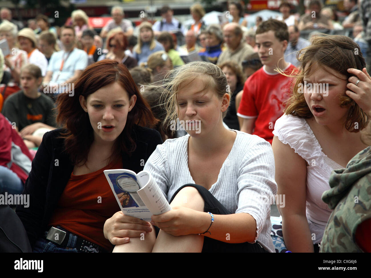 Koeln 31st, Protestant Church: singing Girls Stock Photo - Alamy
