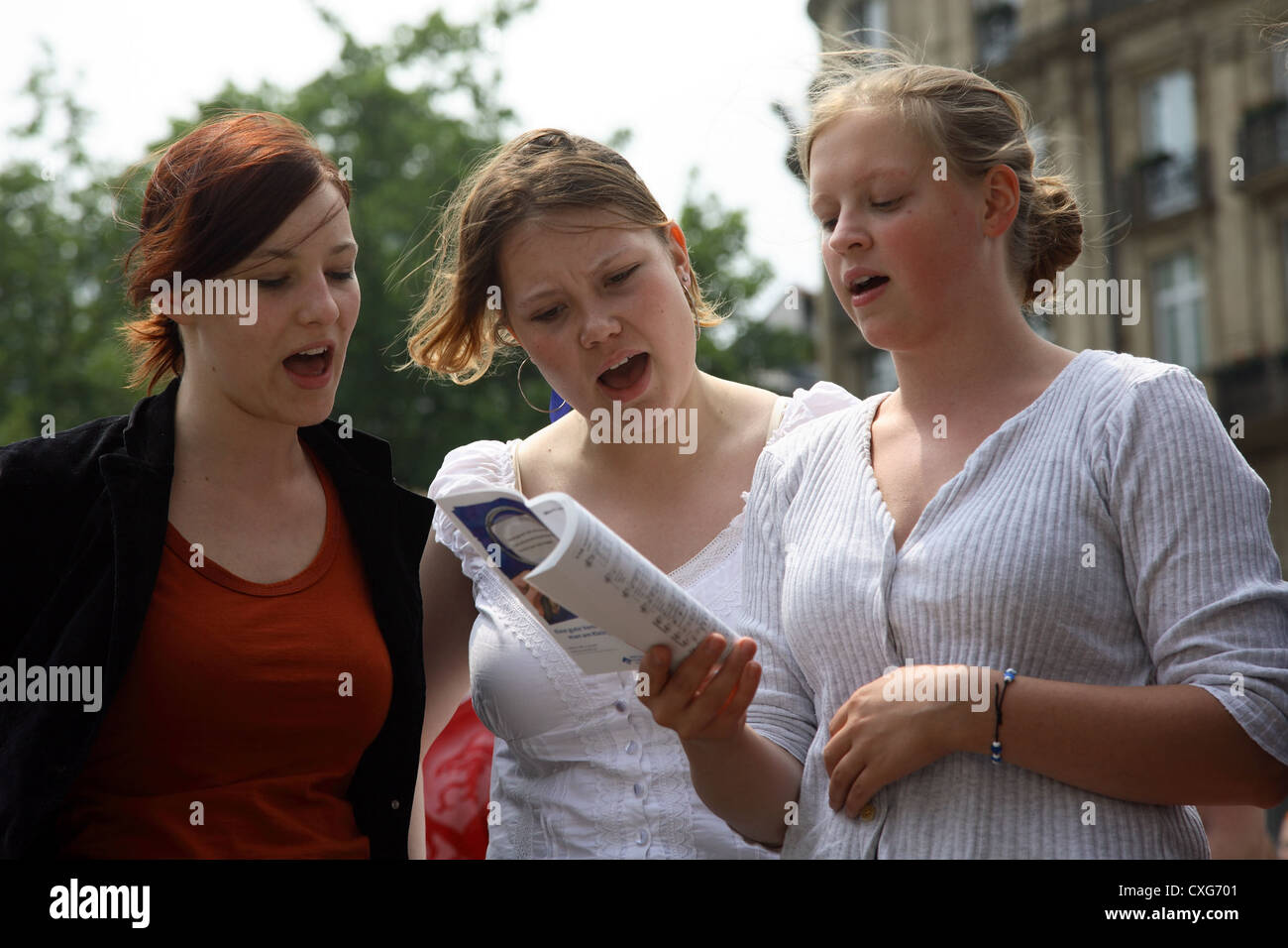 Koeln 31st, Protestant Church: singing Girls Stock Photo - Alamy