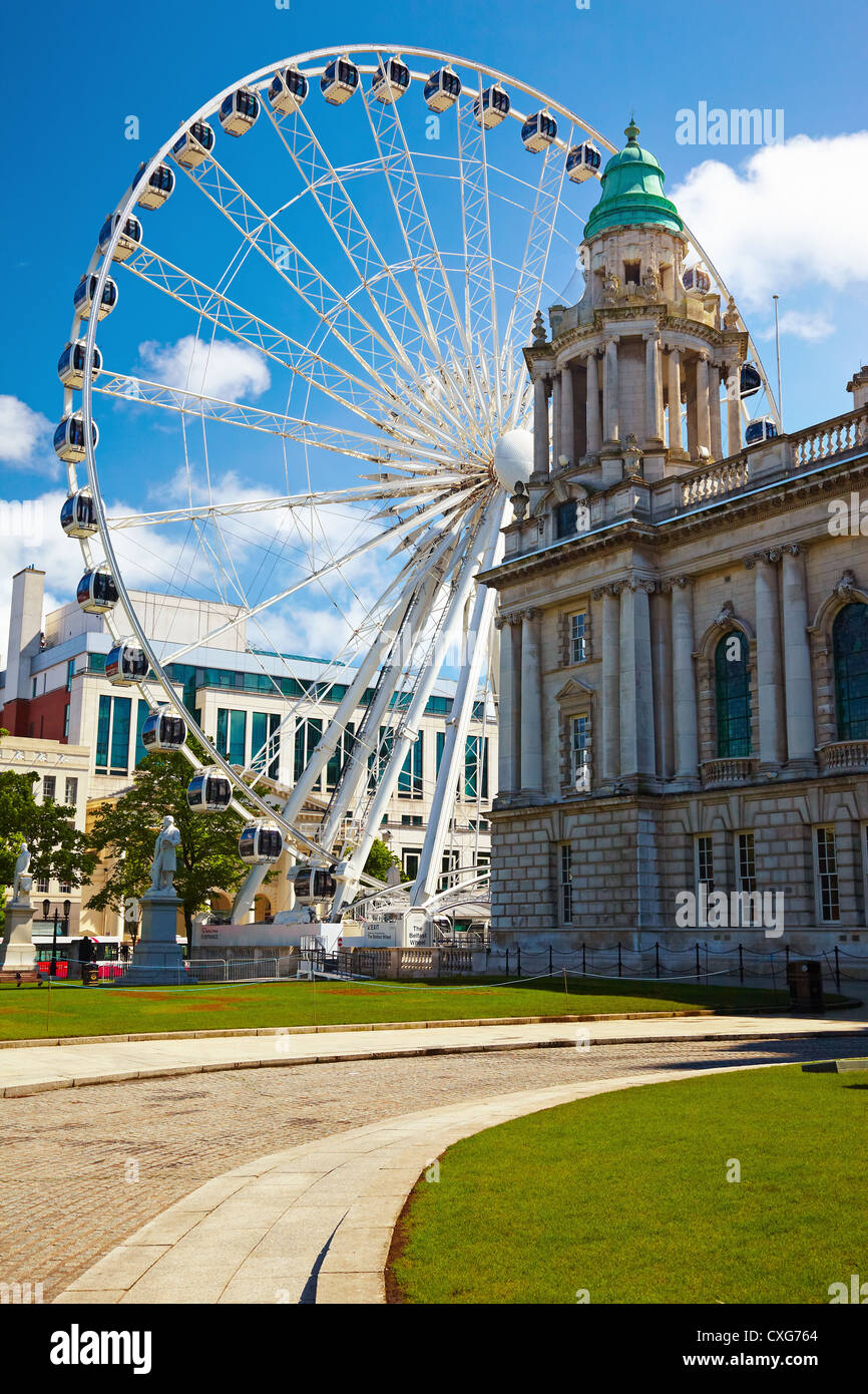 Belfast City Hall and Ferris wheel Stock Photo - Alamy
