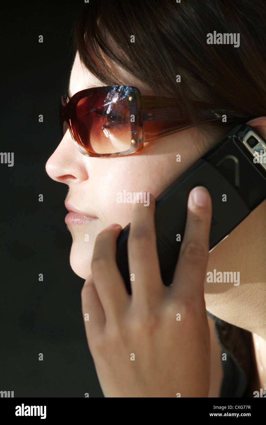 Berlin woman phoned her mobile phone Stock Photo - Alamy