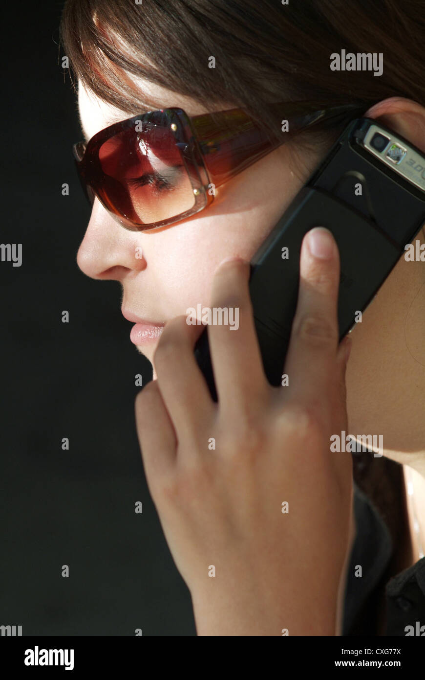 Berlin woman phoned her mobile phone Stock Photo - Alamy