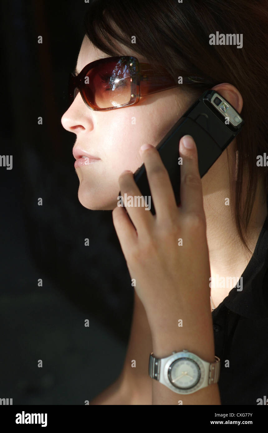 Berlin woman phoned her mobile phone Stock Photo - Alamy