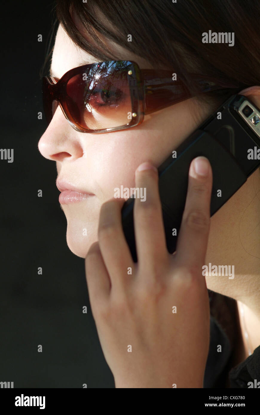 Berlin woman phoned her mobile phone Stock Photo - Alamy