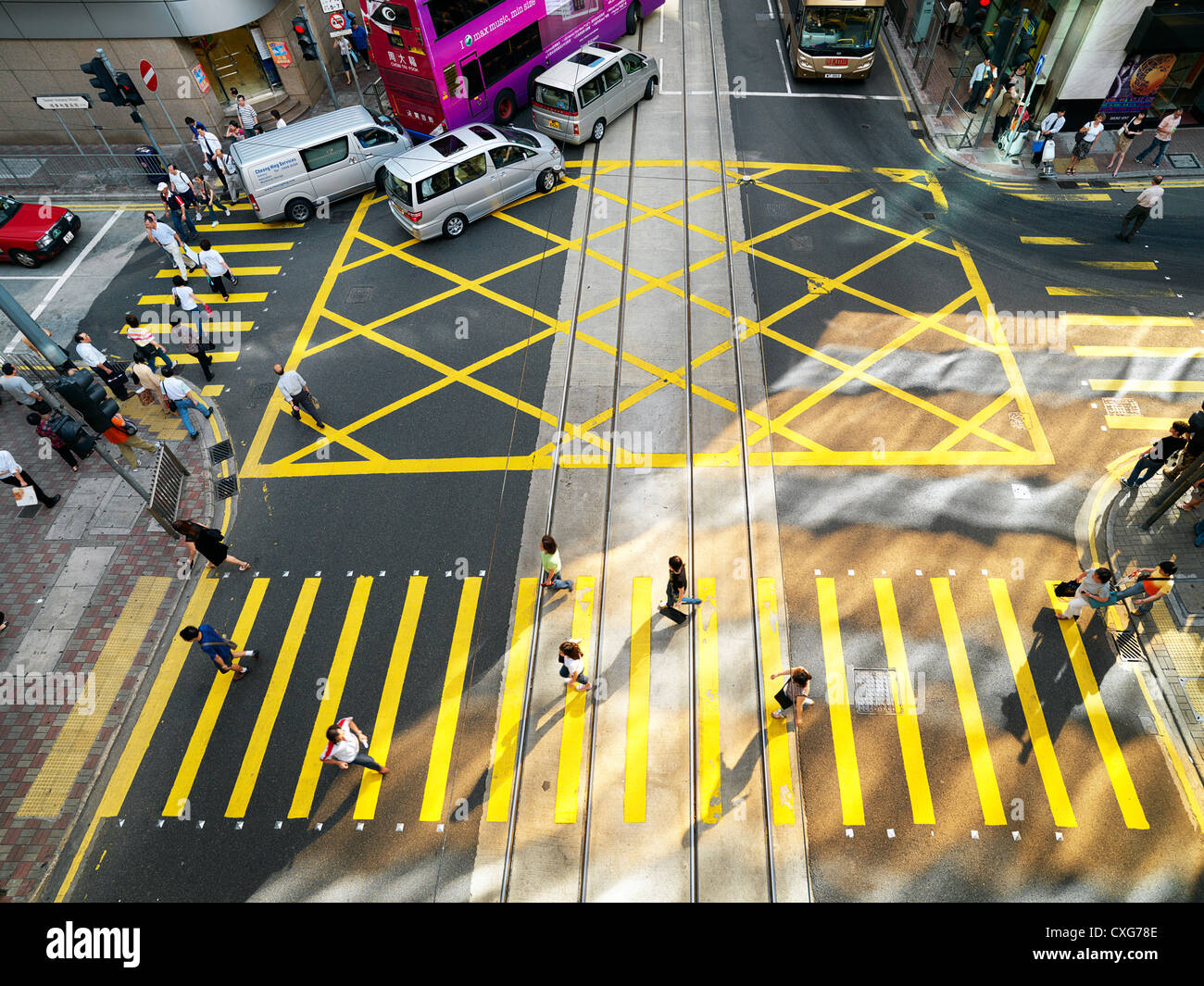 A busy intersection in the financial district in Central, Hong Kong ...