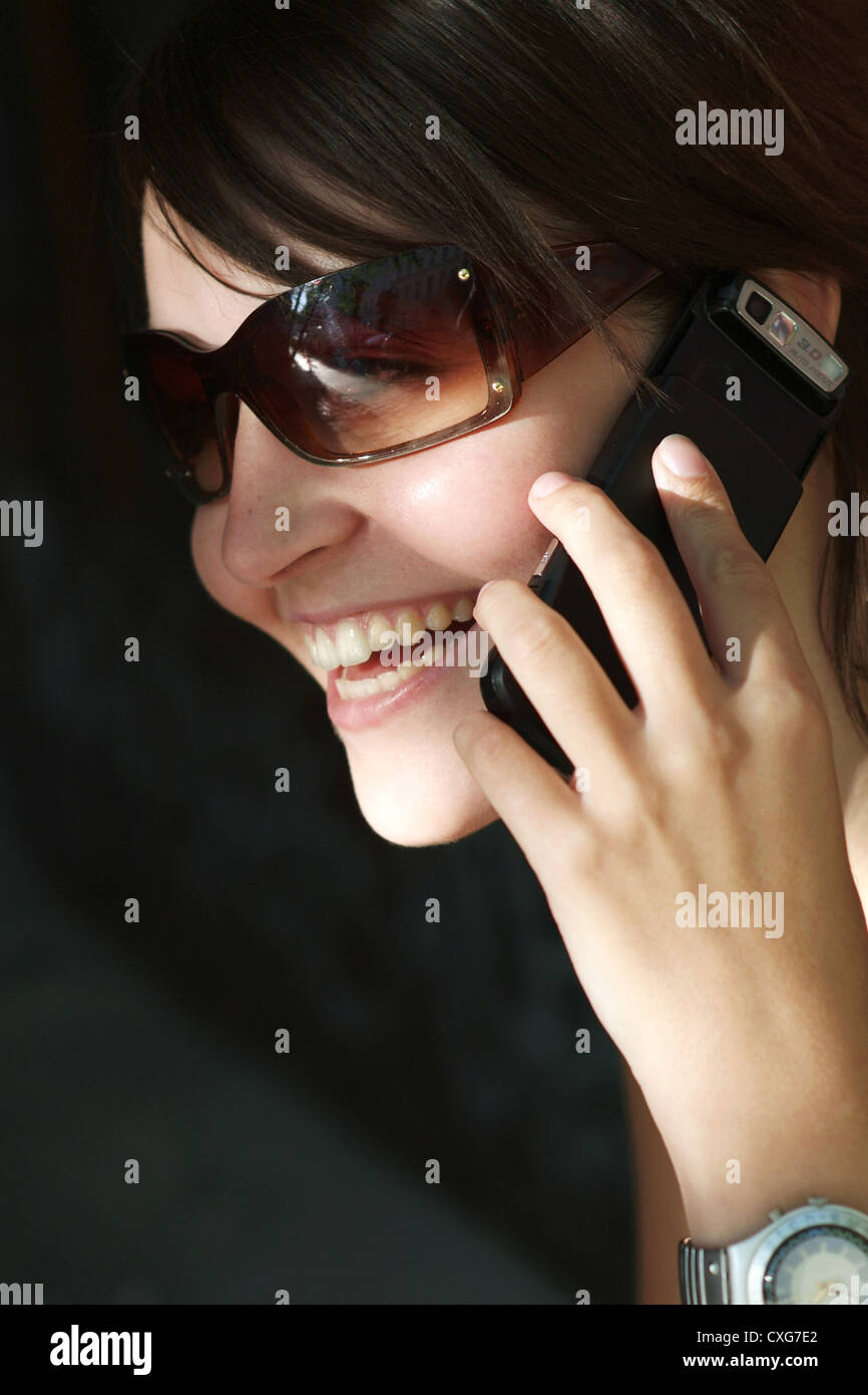 Berlin woman phoned her mobile phone Stock Photo - Alamy